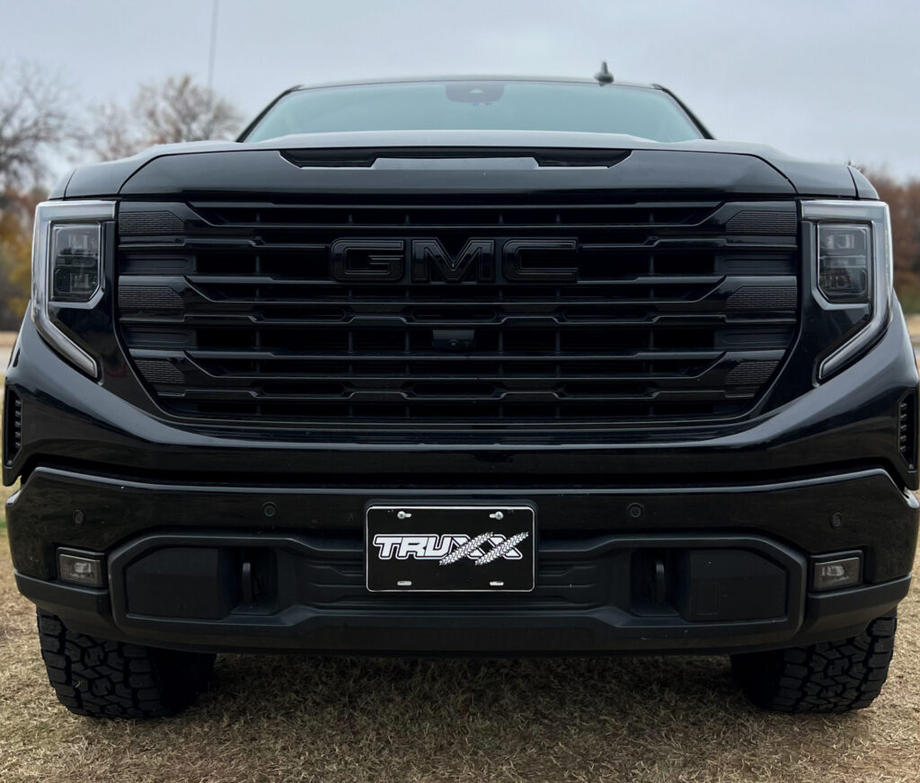 Fearlessly Upgraded: GMC Sierra Built with a Level Lift, Blackout ...